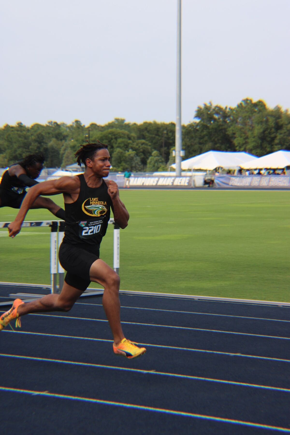 Kai Evans Soars to Victory: Lake Minneola High Track Star Dominates ...